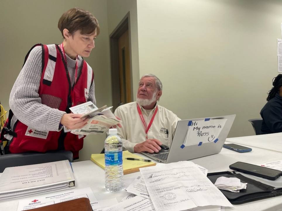 Red Cross Workers Confer at the FEMA Disaster Relief Center | News ...
